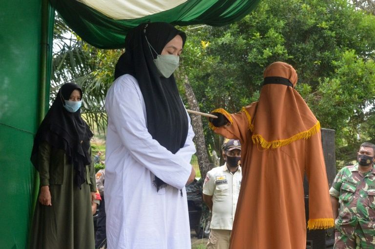 Indonesian Woman Flogged 100 Times For Adultery Partner Gets 15 Ibtimes